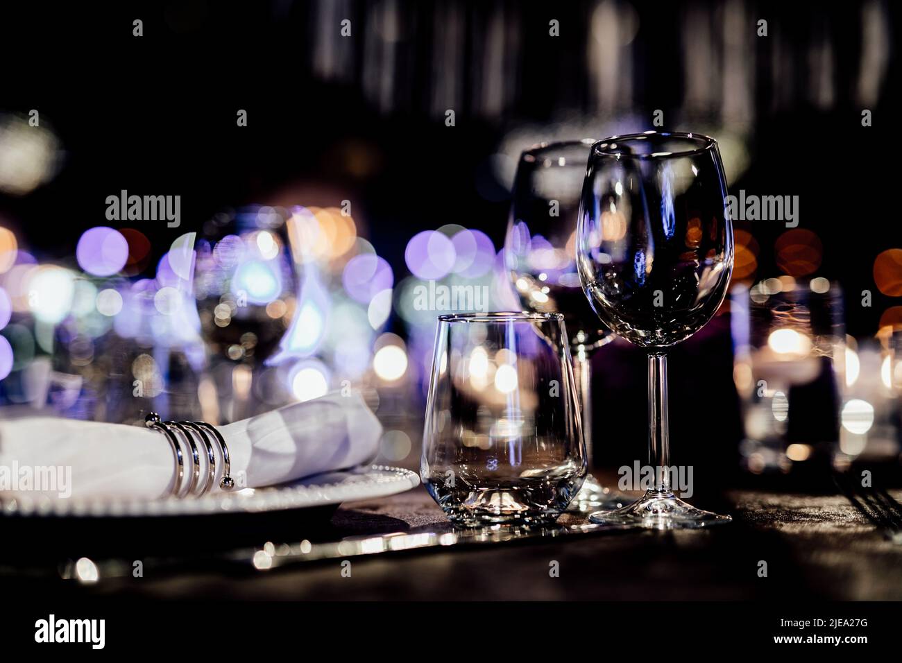 Luxury table settings for fine dining with and glassware, pouring wine ...