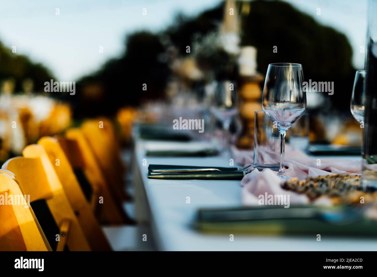 Luxury table settings for fine dining with and glassware, pouring wine ...