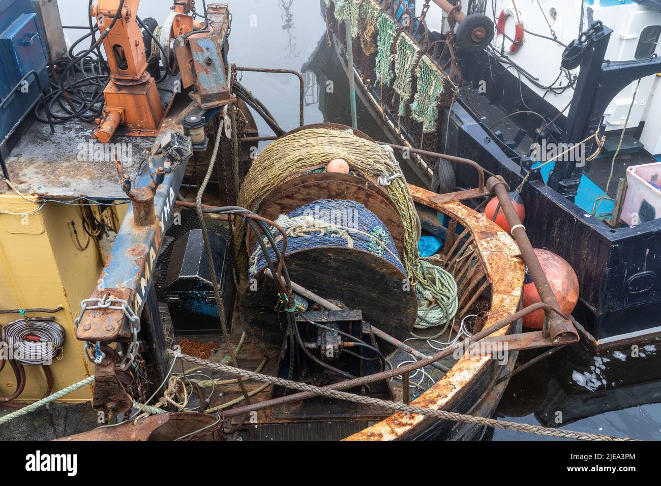 trawler winding gear and nets Stock Photo - Alamy