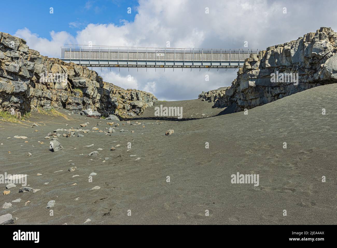 black lava sand with bridge on Iceland of Reykjanes Peninsula ...