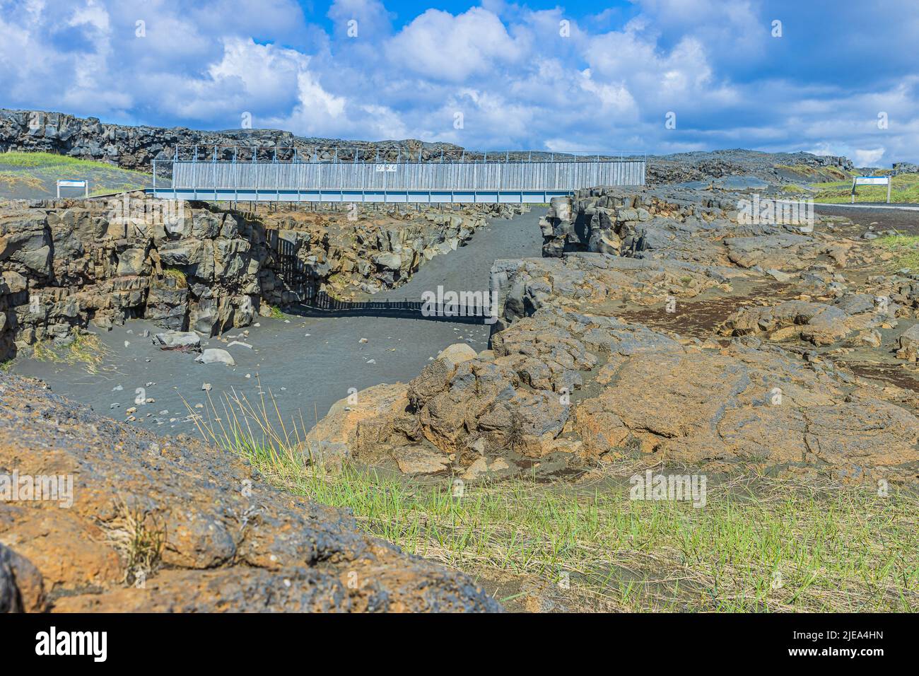 Nature landscape on Iceland of Reykjanes peninsula. Metal bridge in the ...