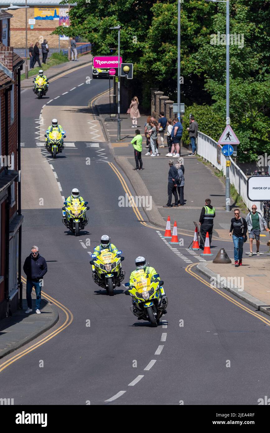 Rolling road block motorcycle riders riding the road race course ...