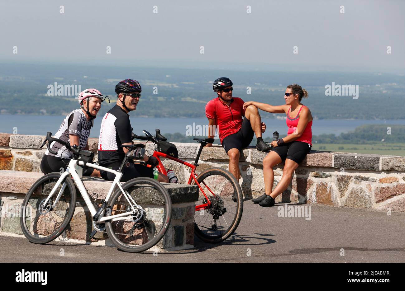 Cyclists take in the view at the Champlain Lookout in Gatineau Park in ...