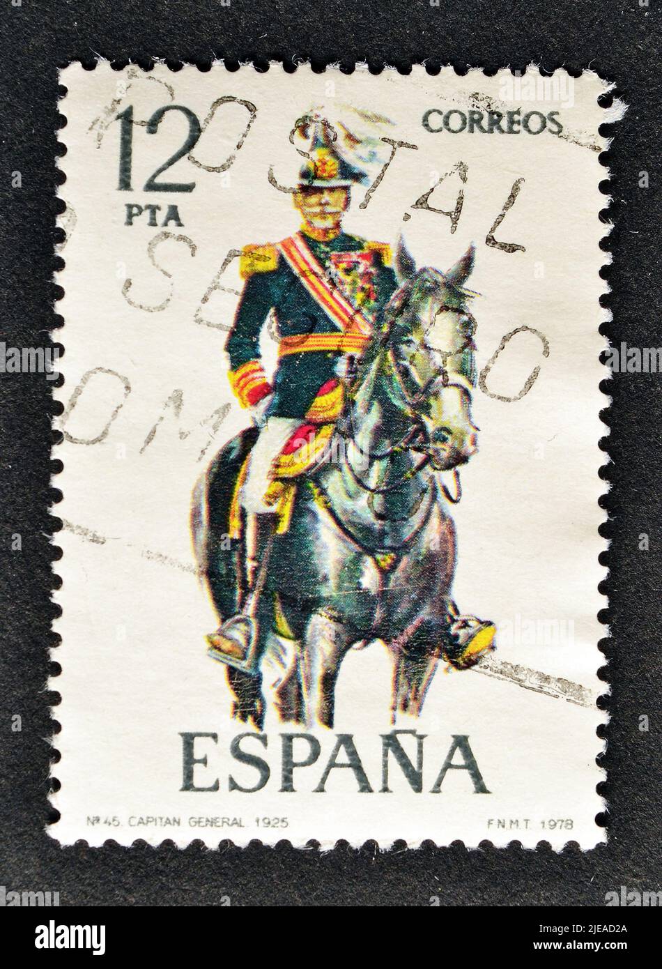 Cancelled postage stamp printed by Spain, that shows Military Uniforms ...