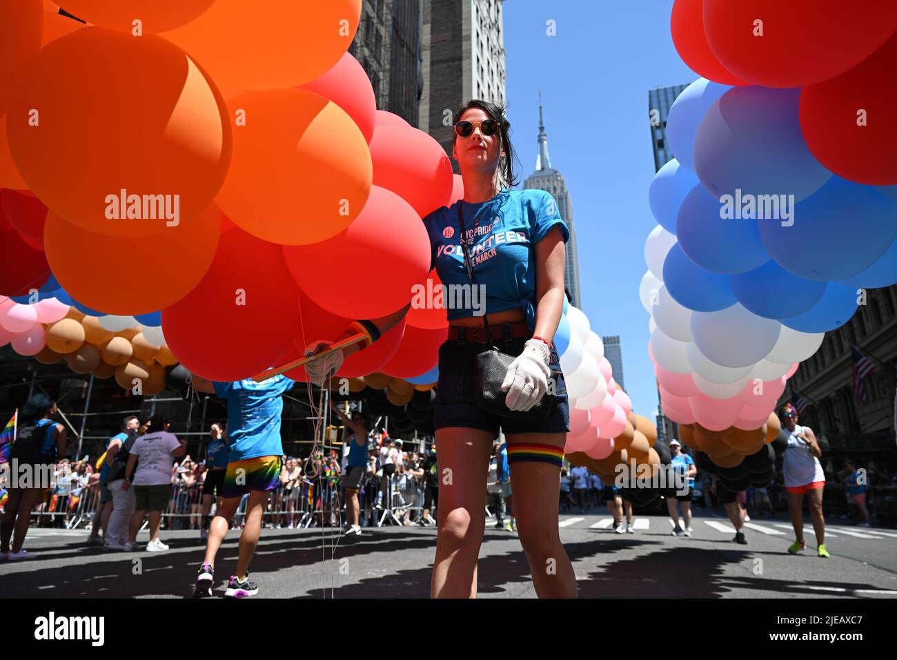 People participate in the NYC Pride March on June 26, 2022 in New York ...