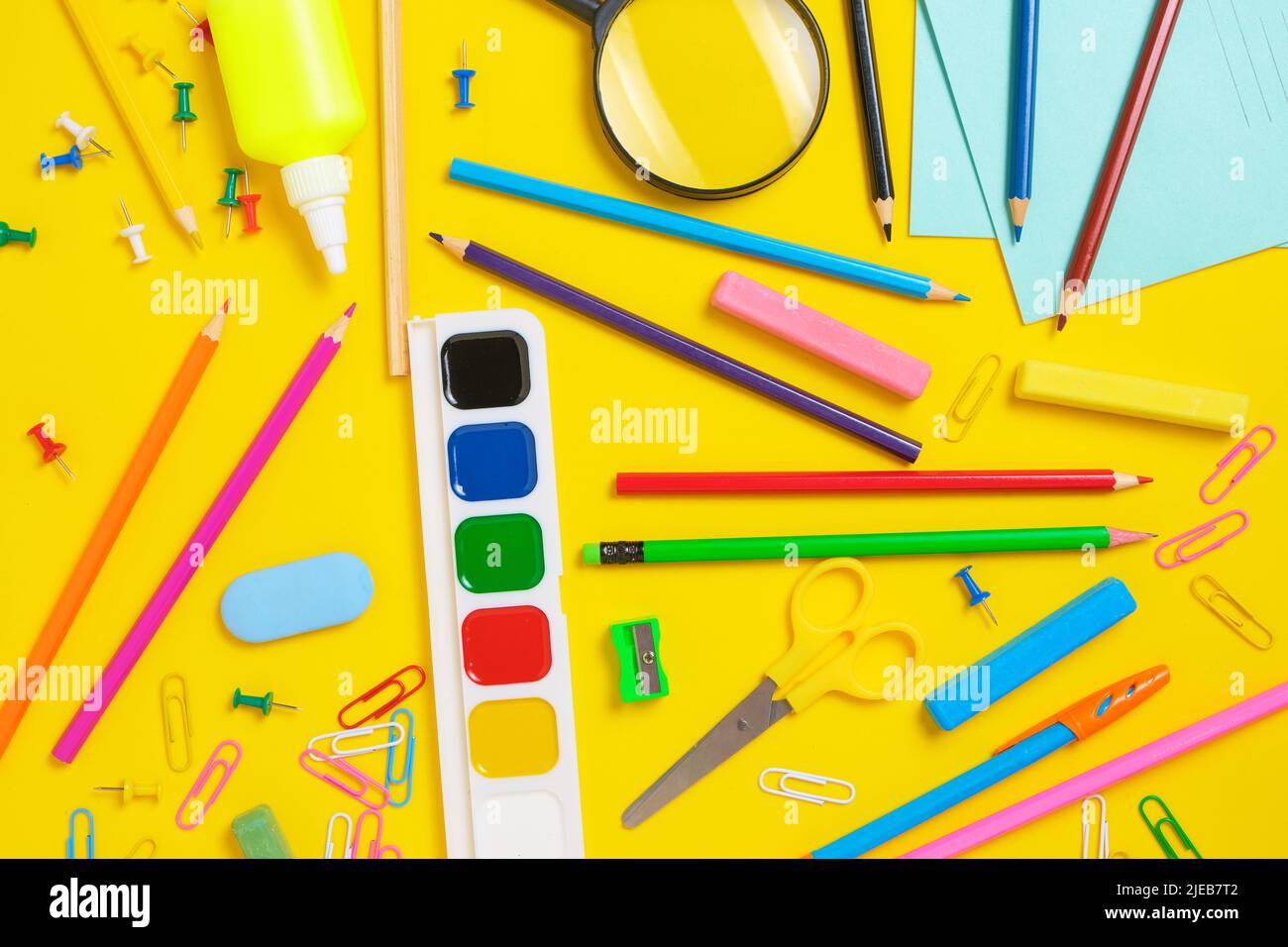 School supplies and stationery yellow background.Preparing child for ...
