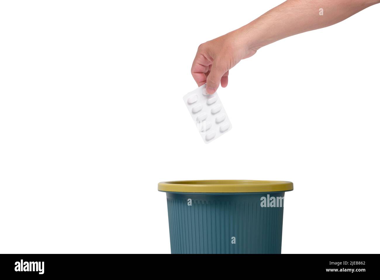 Throw package pills in trash.Isolated white background Stock Photo - Alamy