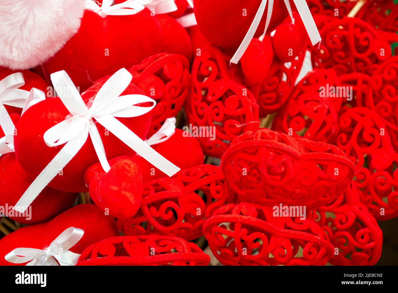 Valentine day concept. Many red hearts for flowers on red background ...