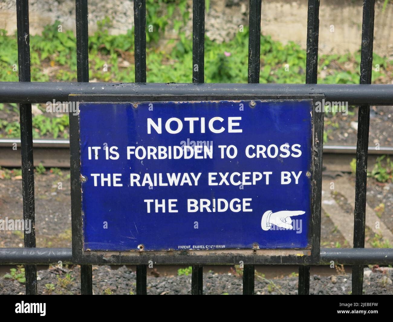Vintage blue sign at Fawley Hill steam railway: "NOTICE It is forbidden ...