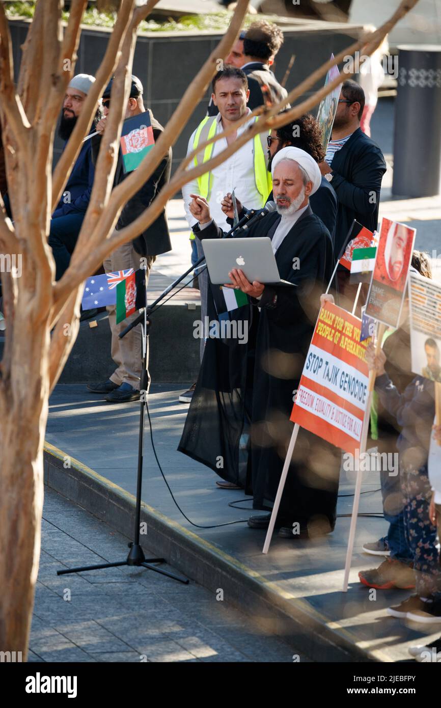 Spiritual leader Ustad Zara speaks to the crowd during the rally in ...