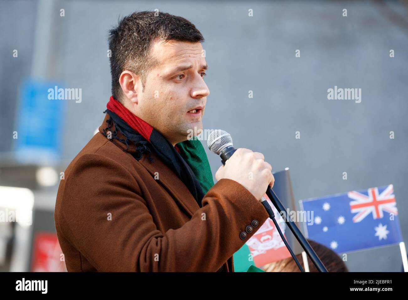 President of the Afghan Community Association Haroon Sadat speaks to ...