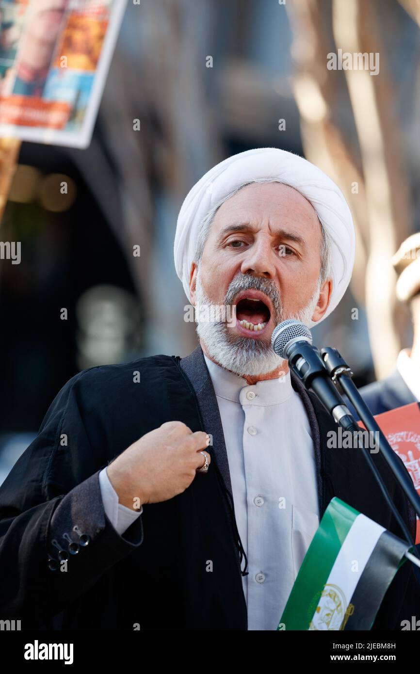Spiritual leader Ustad Zara speaks to the crowd during the rally in ...