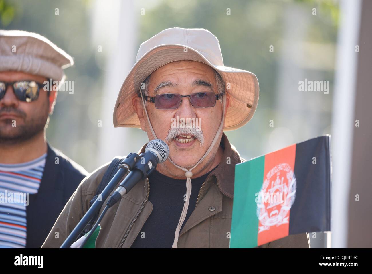 President of the Hazara Ethnic Society Hassan Ghulam speaks to the ...