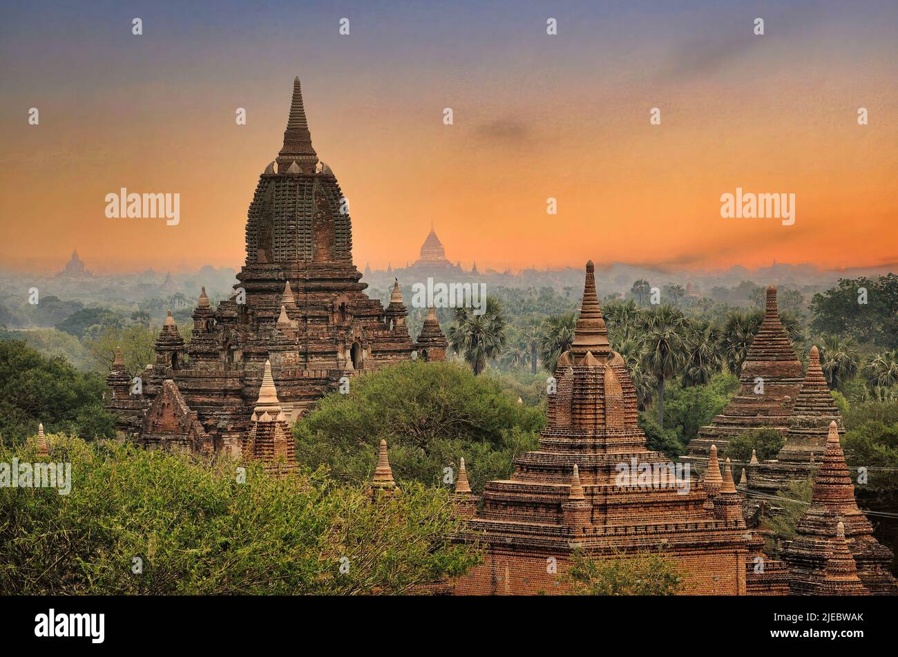A beautiful sunrise illuminates the Temples of the world famous Bagan ...