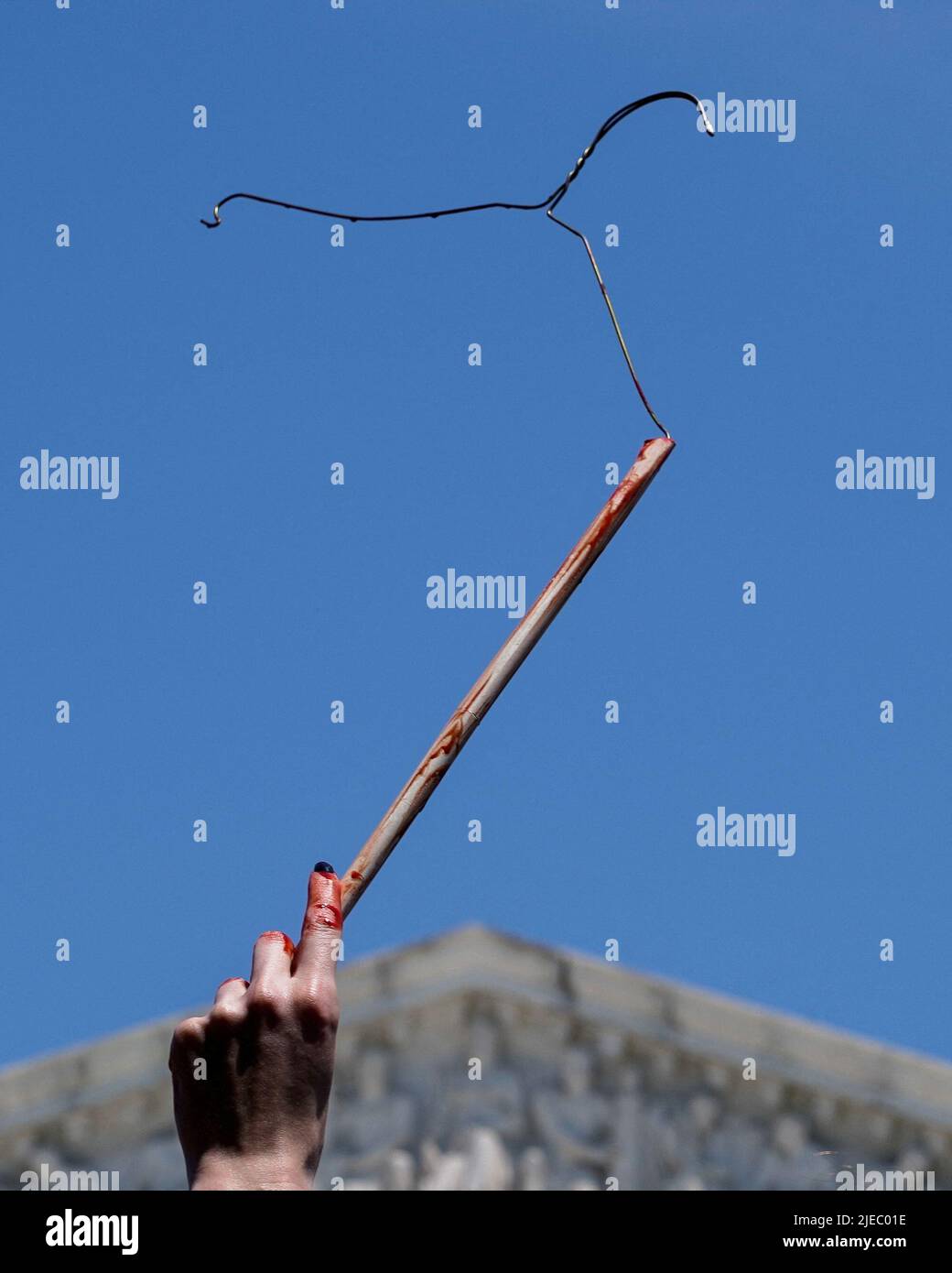 Abortion coat hanger hi-res stock photography and images - Alamy