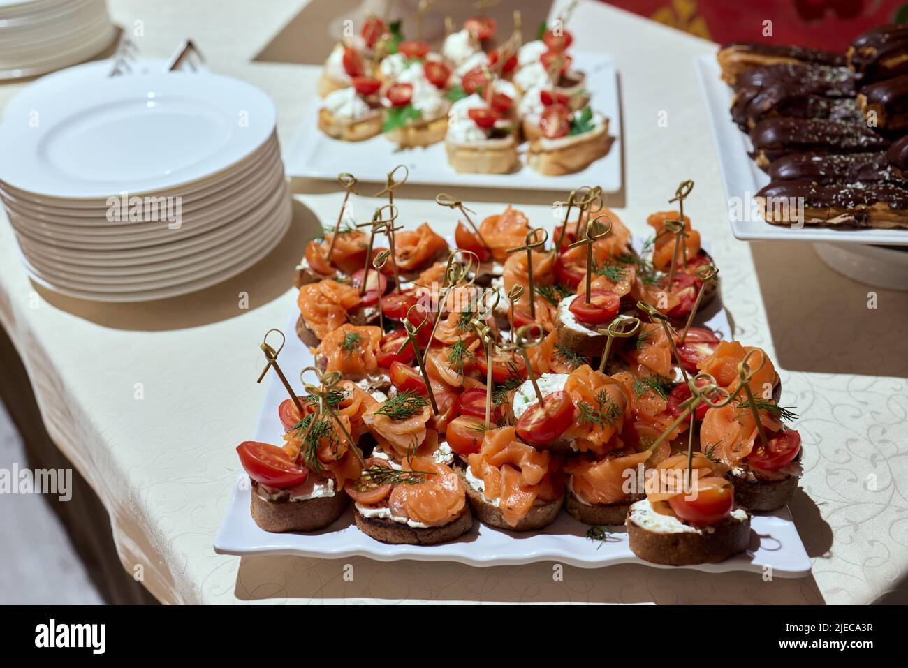 a lot of cold snacks on buffet table, catering Stock Photo - Alamy