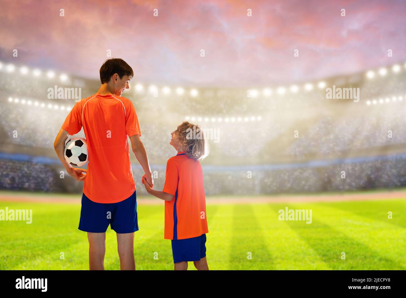 Netherlands football supporter on stadium. Dutch fans on soccer pitch ...