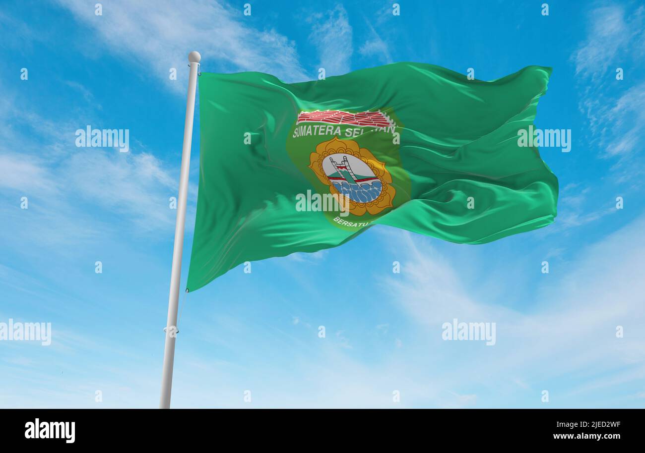 official flag of South Sumatra Indonesia at cloudy sky background on ...