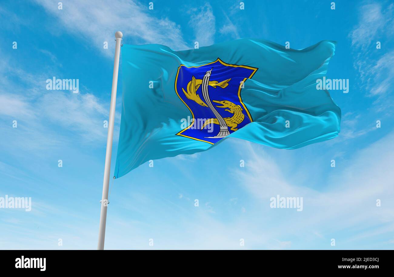 official flag of Surabaya City Indonesia at cloudy sky background on ...
