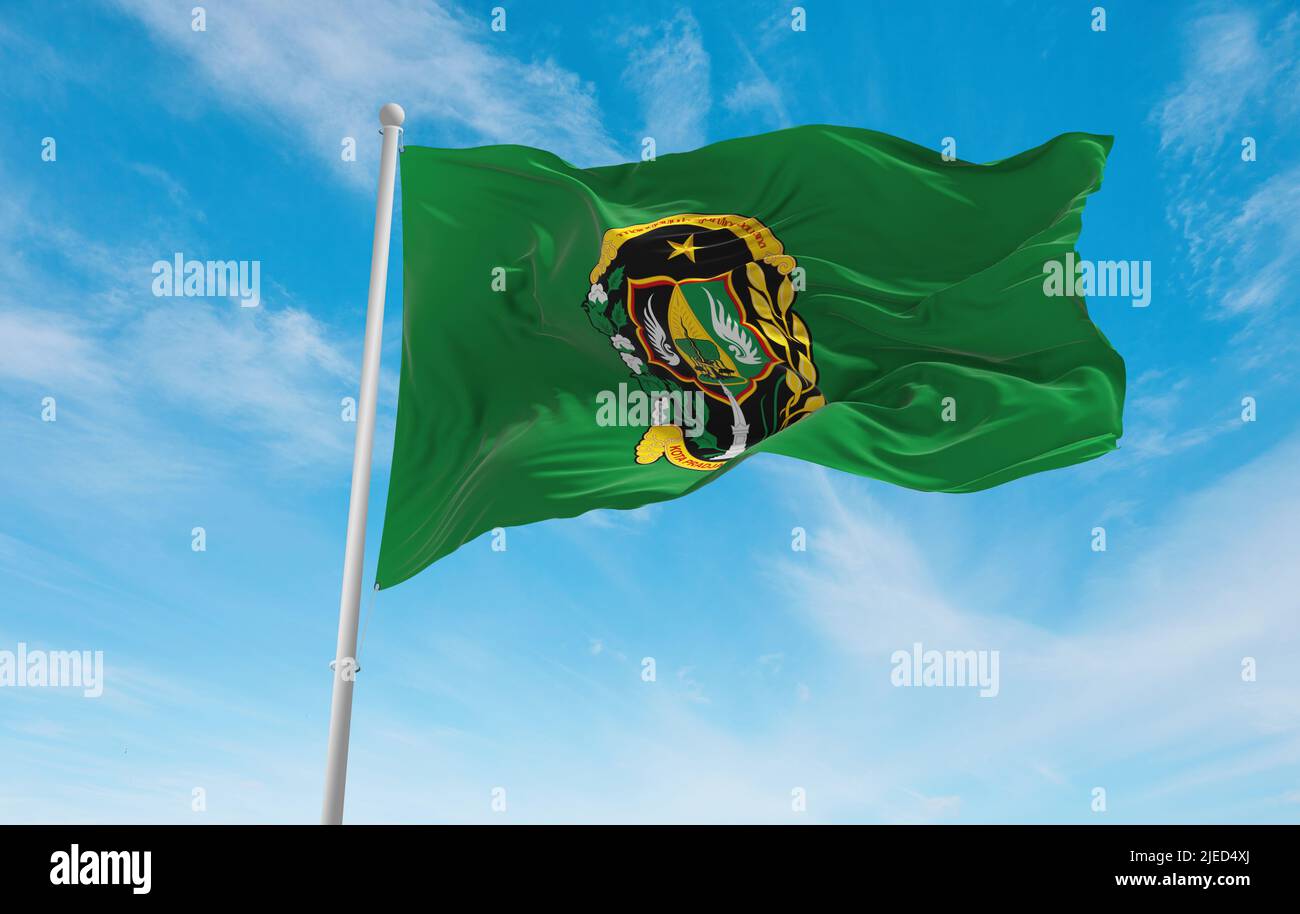 official flag of Yogyakarta City Indonesia at cloudy sky background on ...