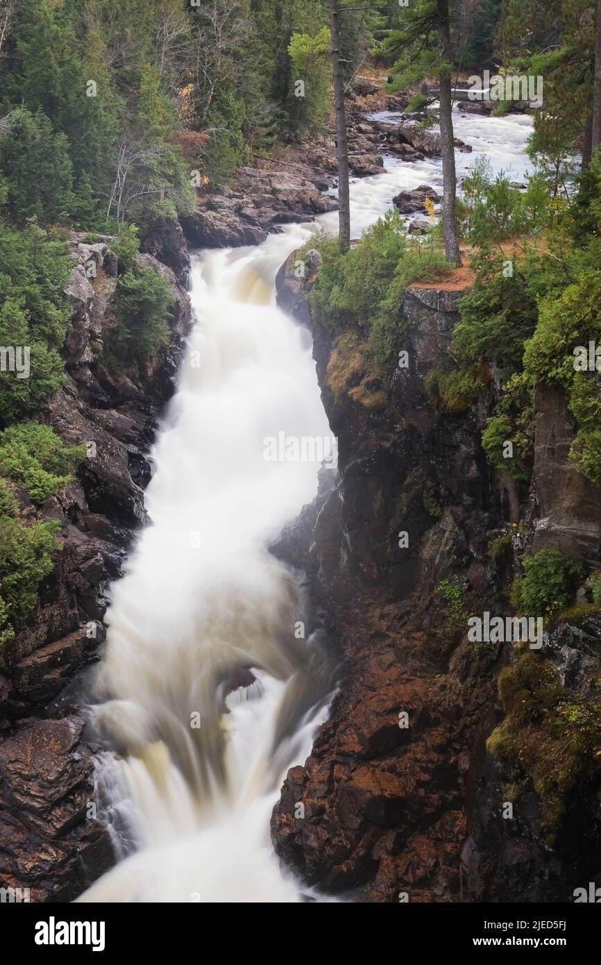 Ouareau river and Dorwin falls through mist in autumn, Rawdon Falls ...