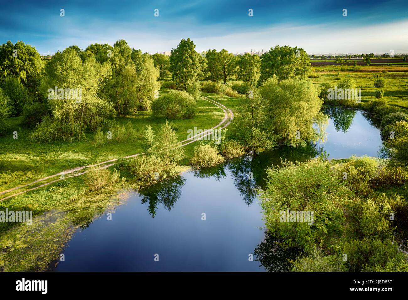 Spring landscape with river Stock Photo - Alamy
