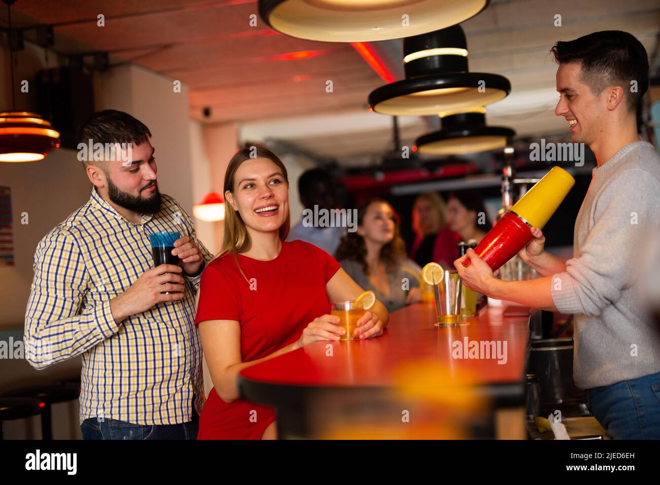 Meeting man and woman in an entertaining night club Stock Photo - Alamy