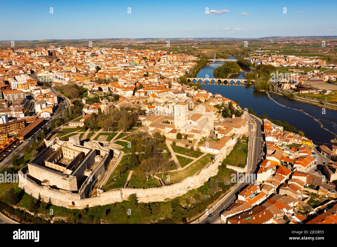 Aerial view of Zamora on Duero river overlooking medieval castle and ...