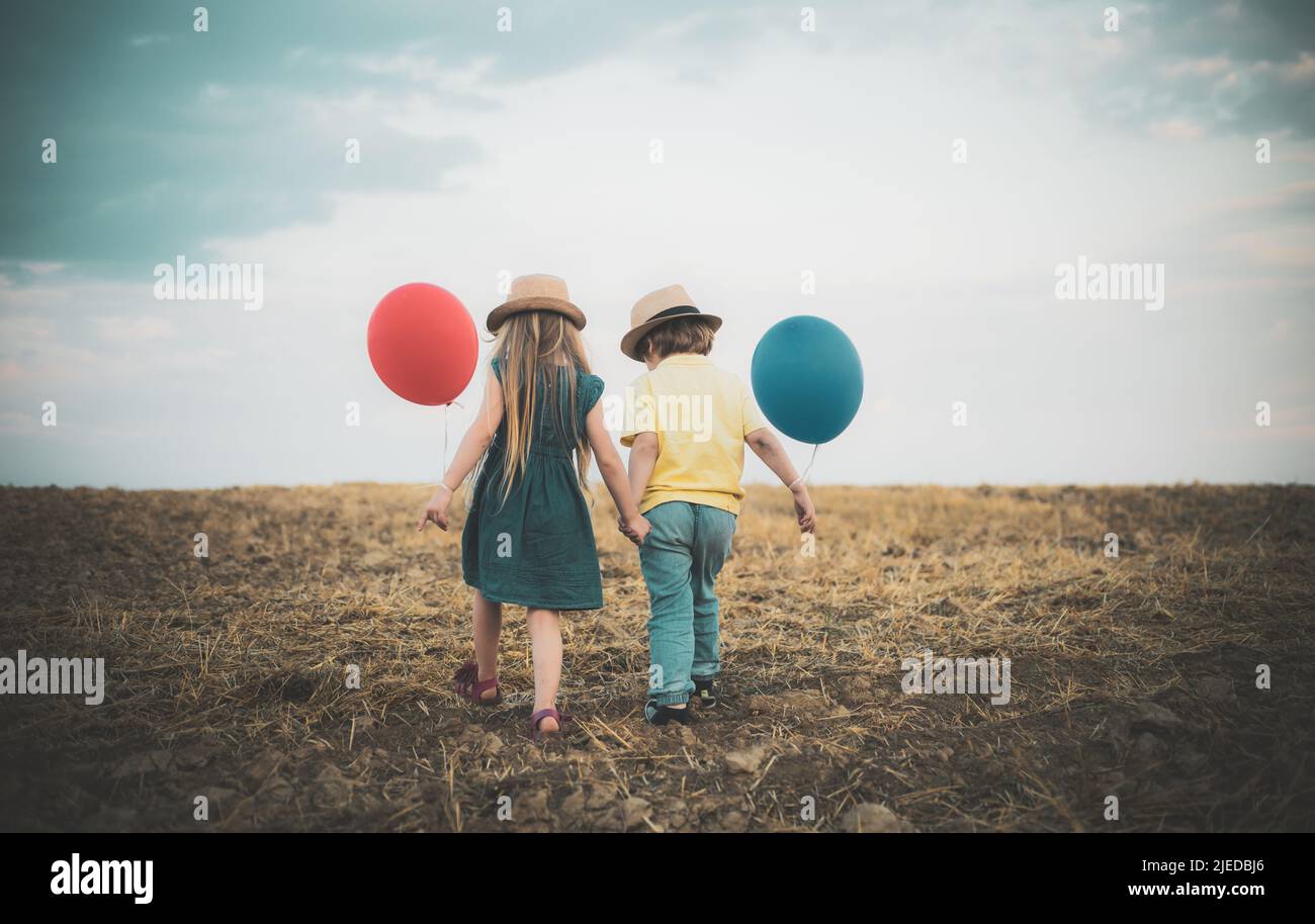 Fool around. Happy. Little girl and boy enjoy walk. Beautiful fun day ...