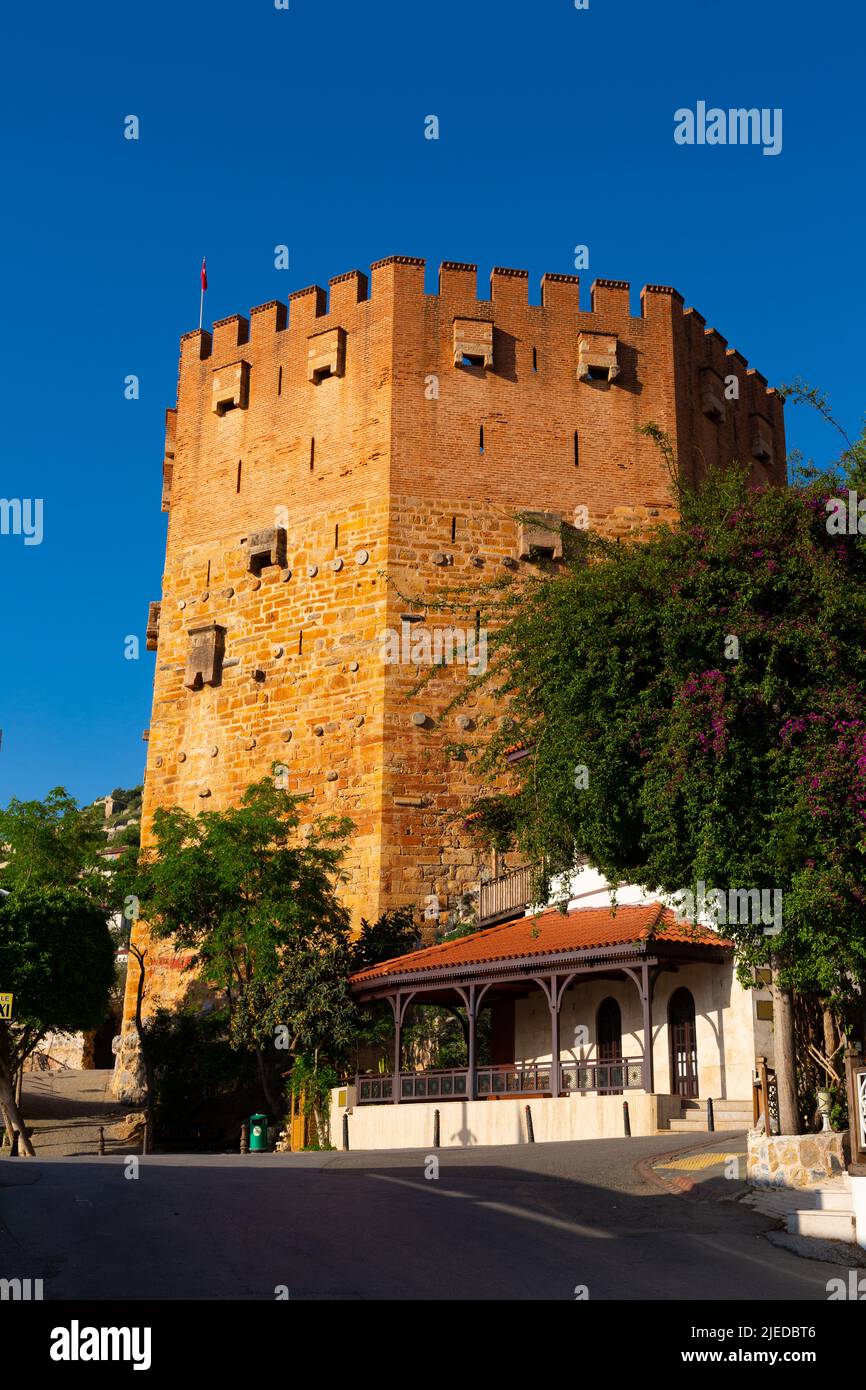 Red Tower and the fortification wall of a medieval castle in Turkish ...