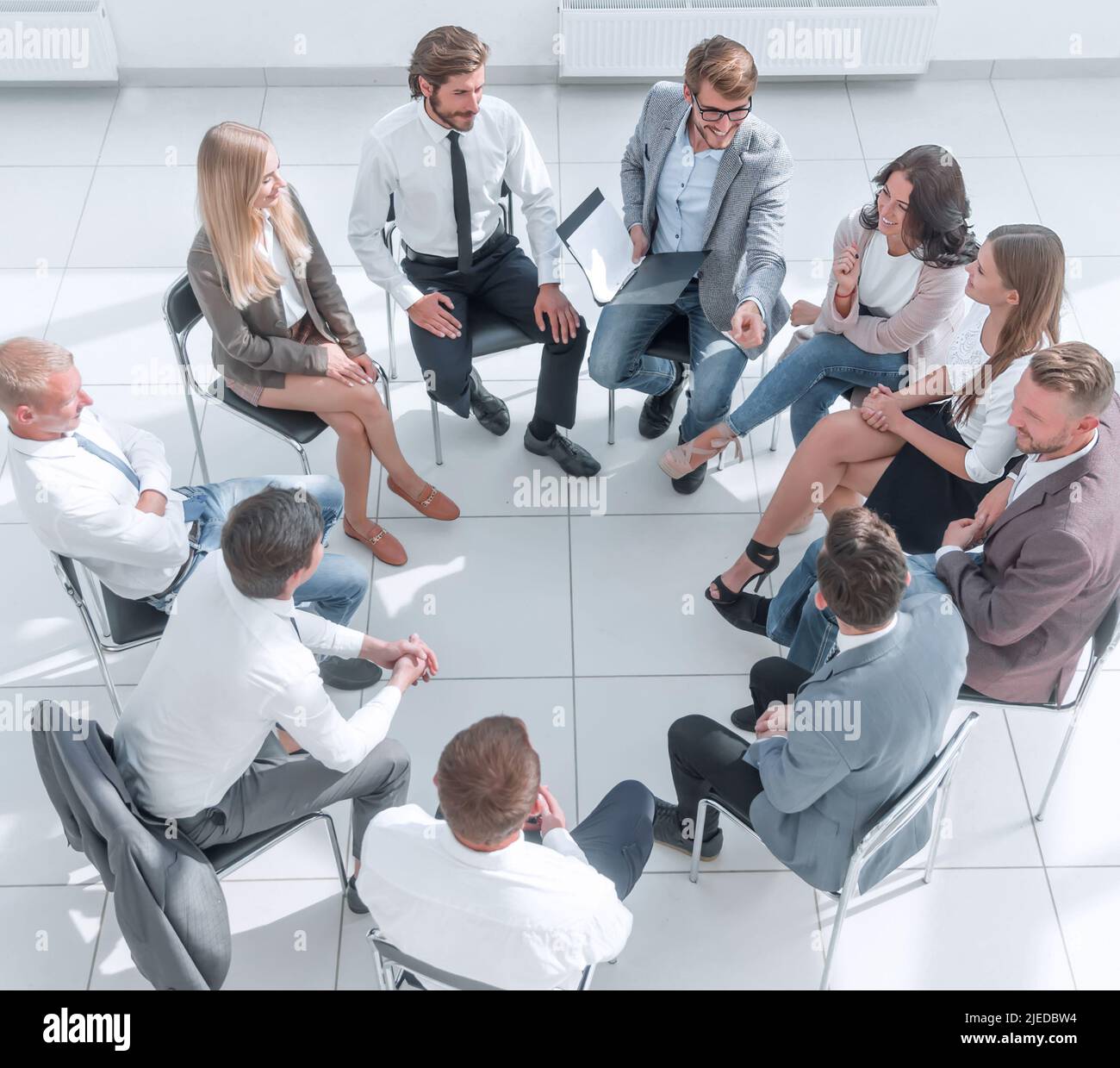 Young employees ask questions hi-res stock photography and images - Alamy