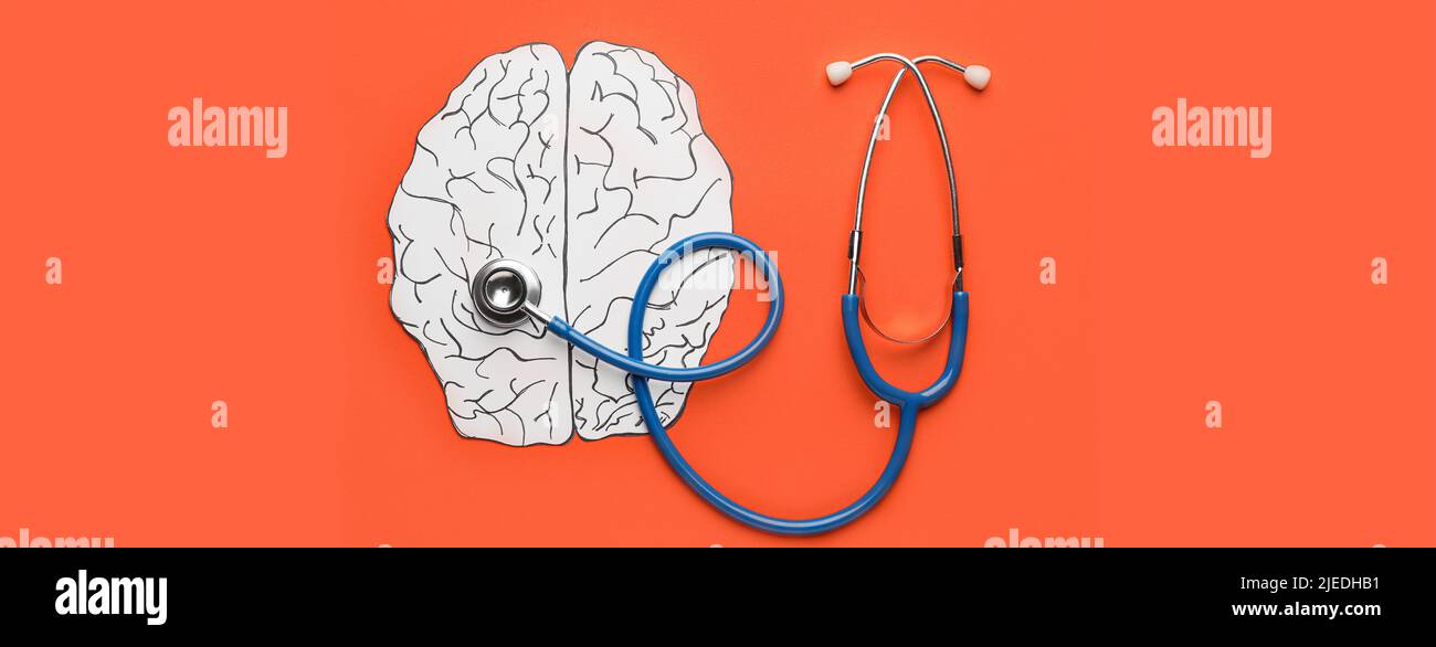 Paper brain and stethoscope on orange background. Concept of brain ...