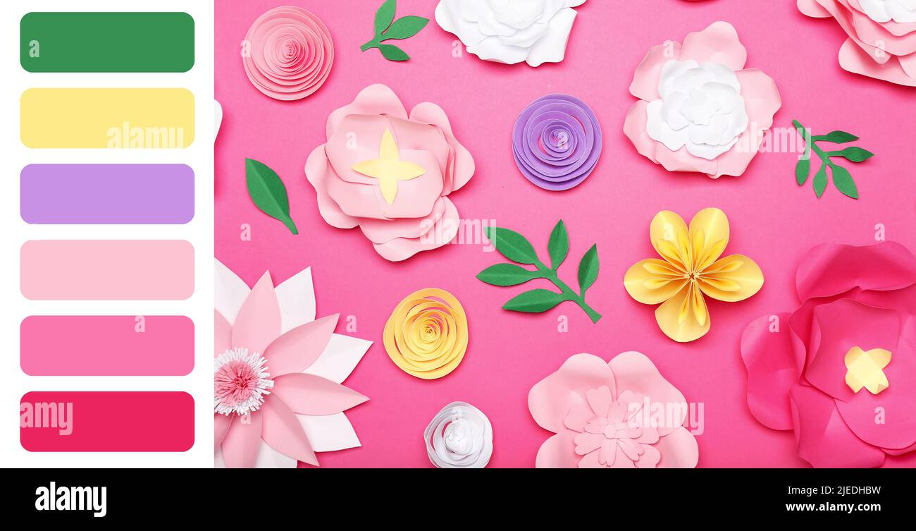 Beautiful handmade paper flowers on pink background. Different color ...