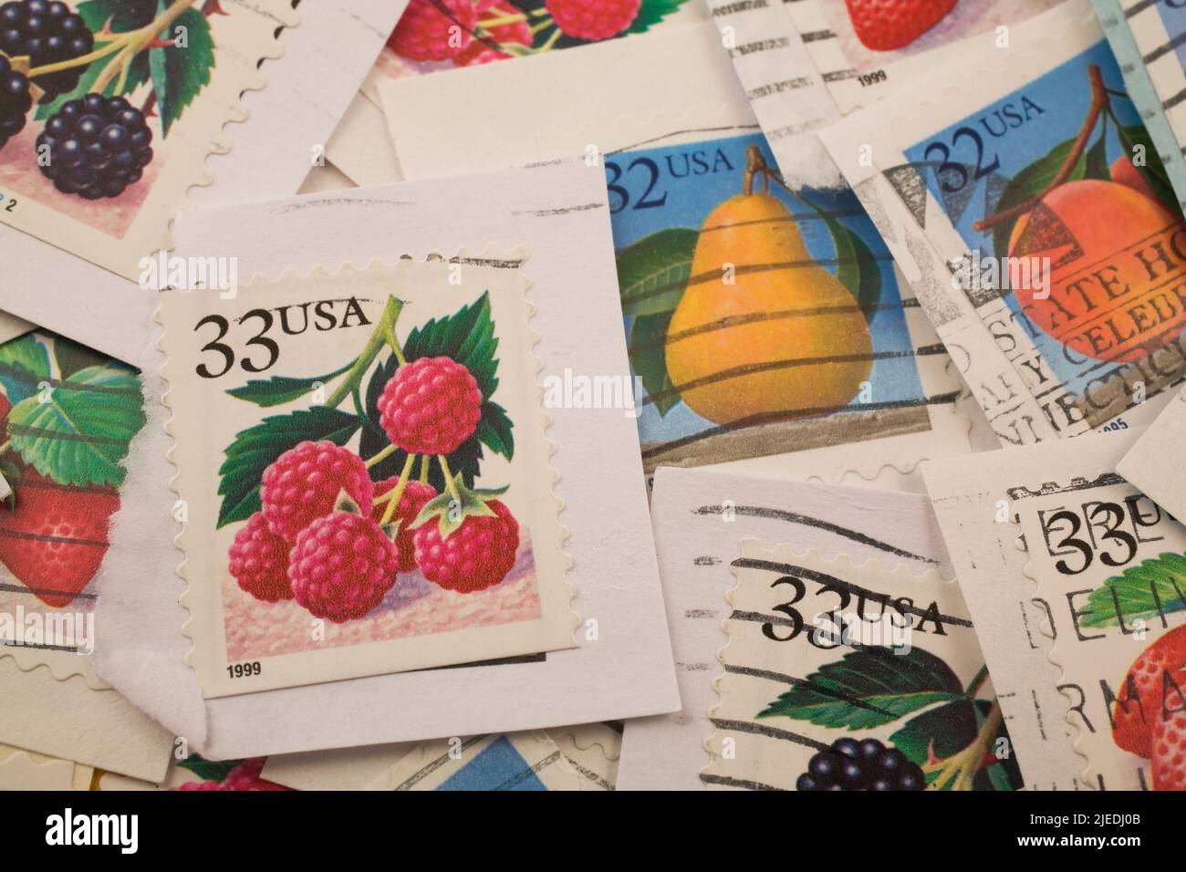 Close-up of old United States postage stamps commemorating various ...