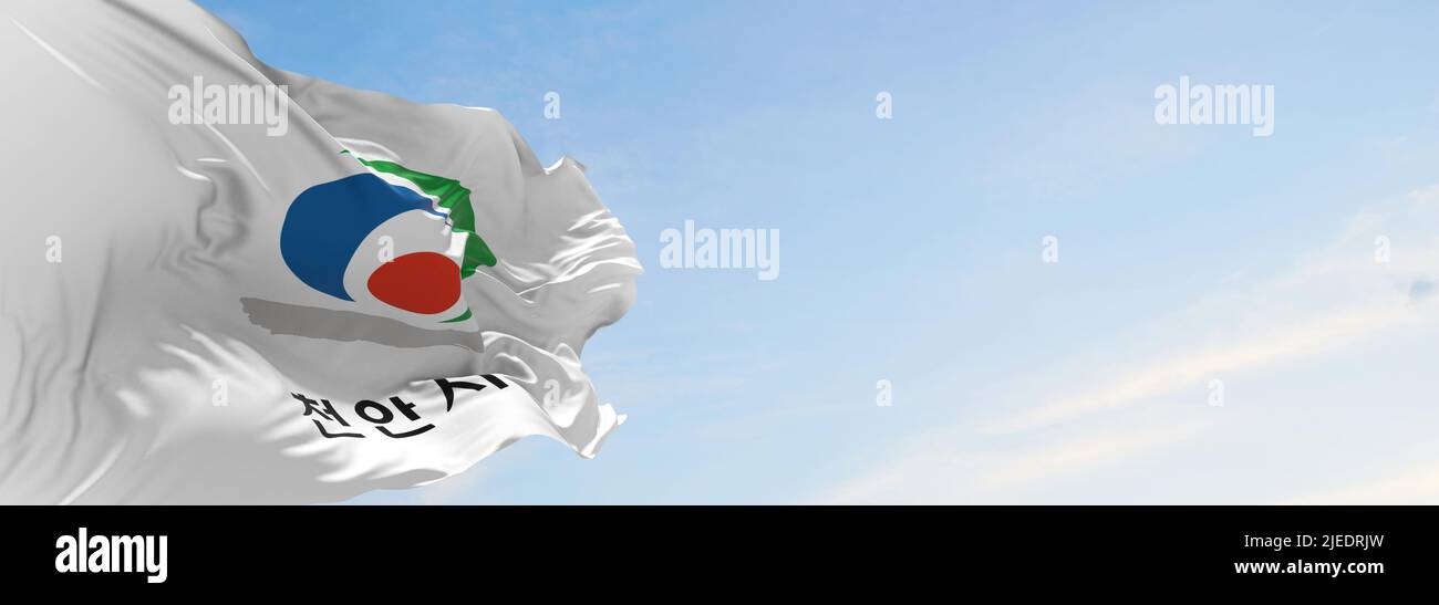 official flag of Cheonan city, South Korea at cloudy sky background on ...
