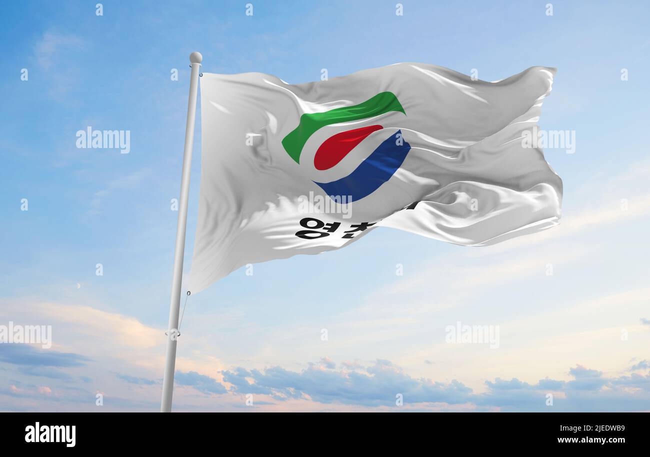 official flag of Yeongcheon city, South Korea at cloudy sky background ...