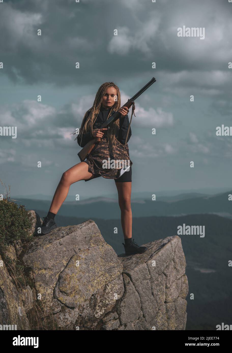 Young woman shooting hunting rifle hi-res stock photography and images ...