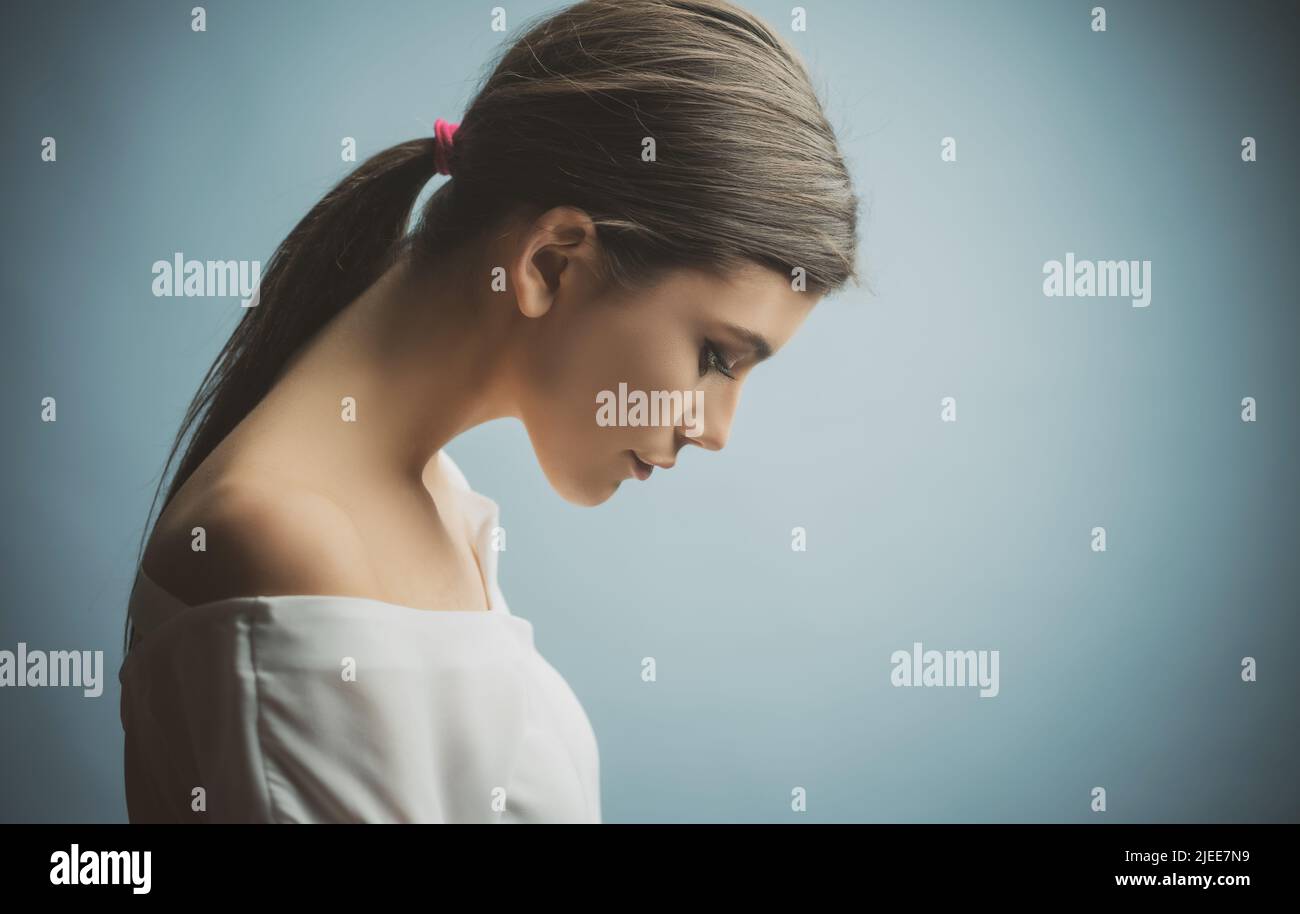 Sadness. Sad woman look down. Depression and life problems Stock Photo ...