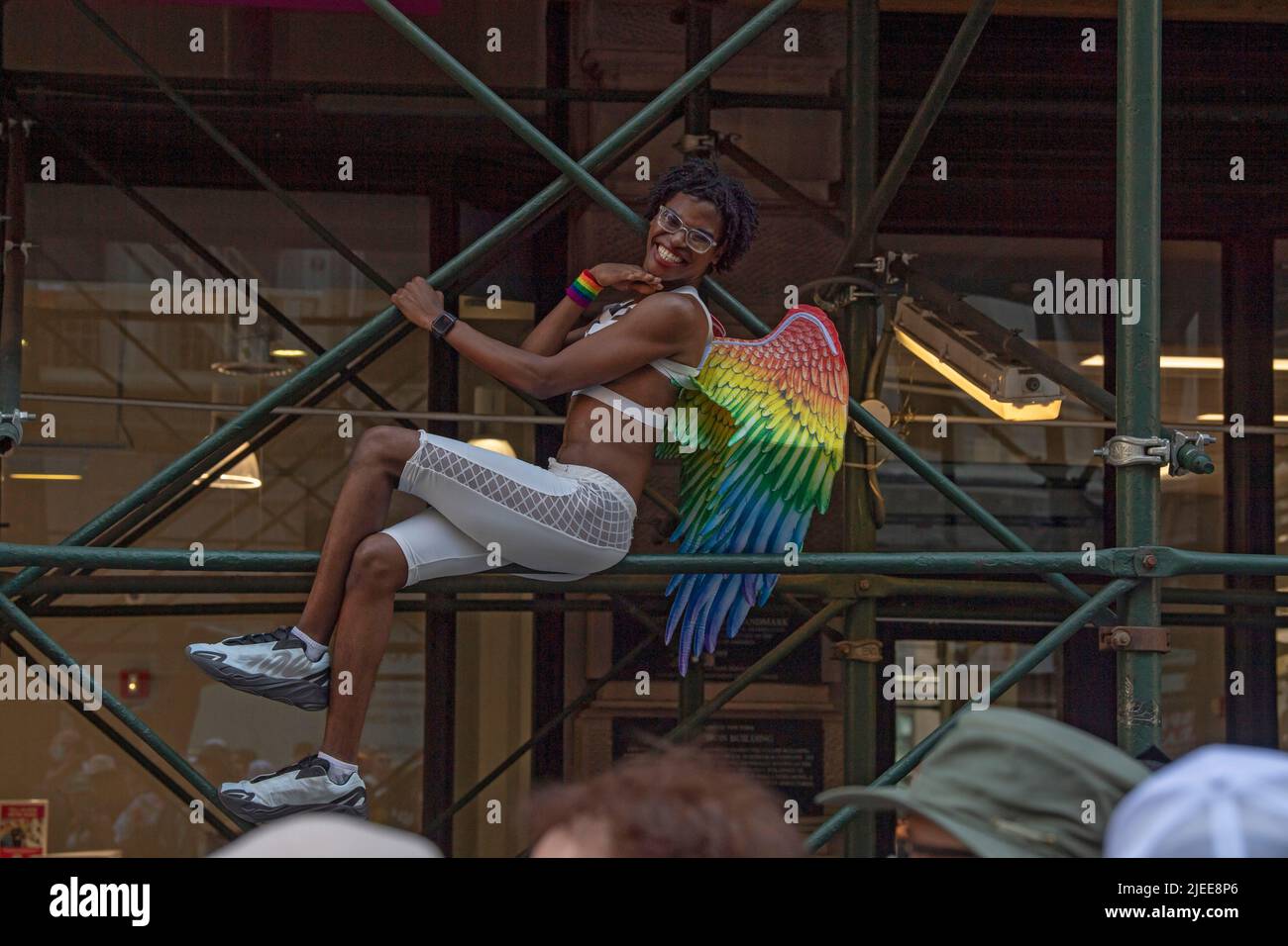 NEW YORK, NEW YORK - JUNE 26: Spectators watch the New York City Pride Parade on June 26, 2022 ...