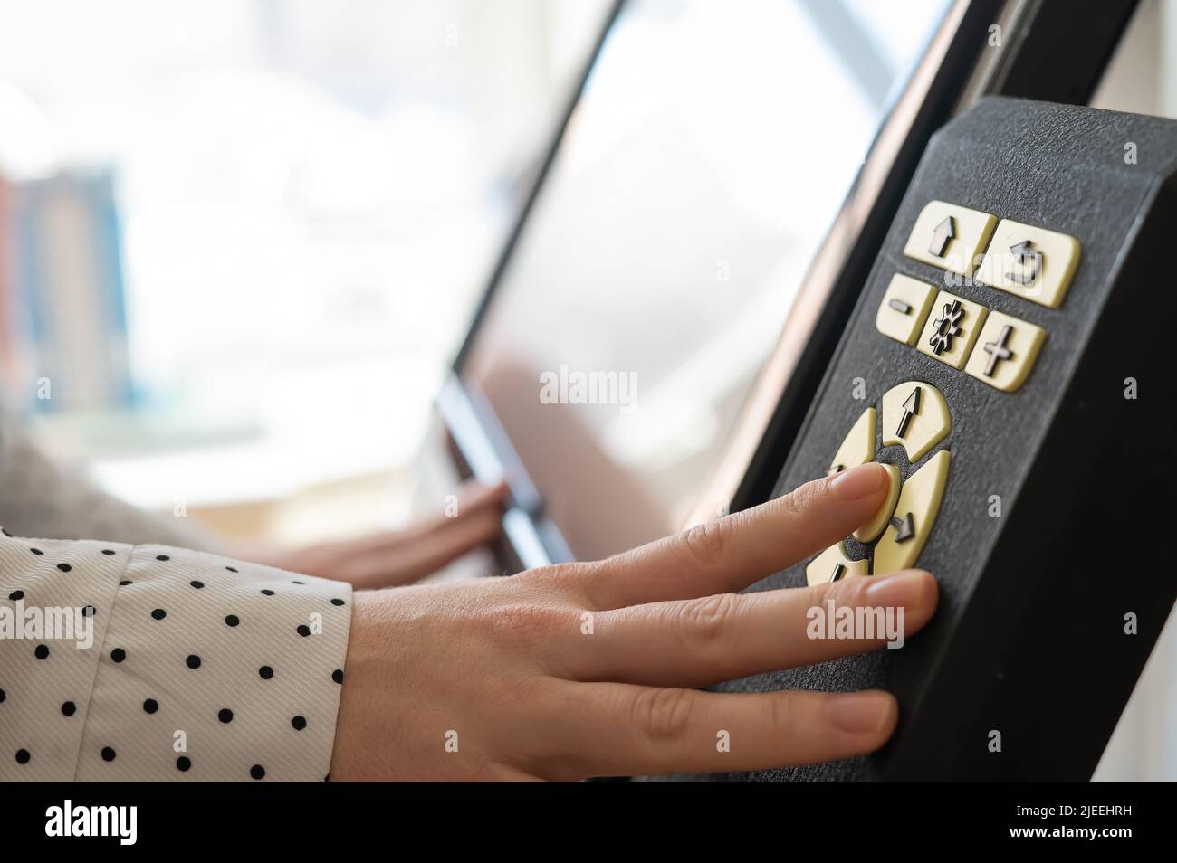 A woman uses a voting device for blind and visually impaired citizens ...