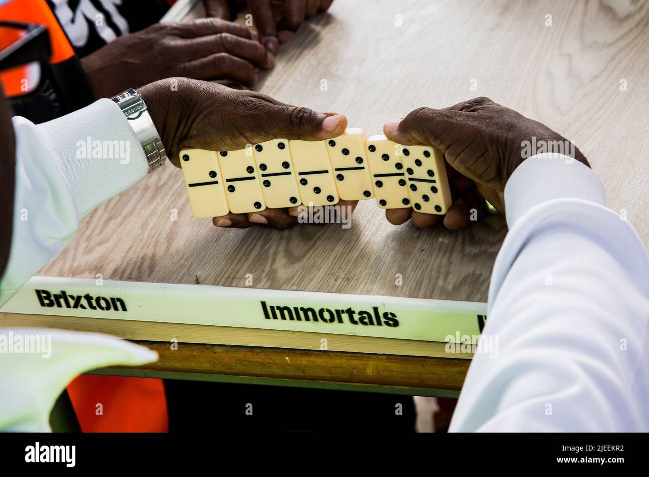 Members of Brixton Immortals Dominos Club play dominos at Windrush ...