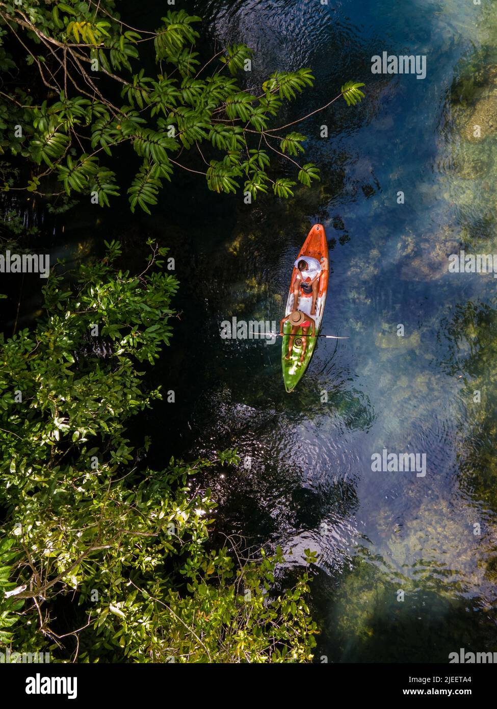 couple in a kayak in the jungle of Krabi Thailand, men and woman in ...