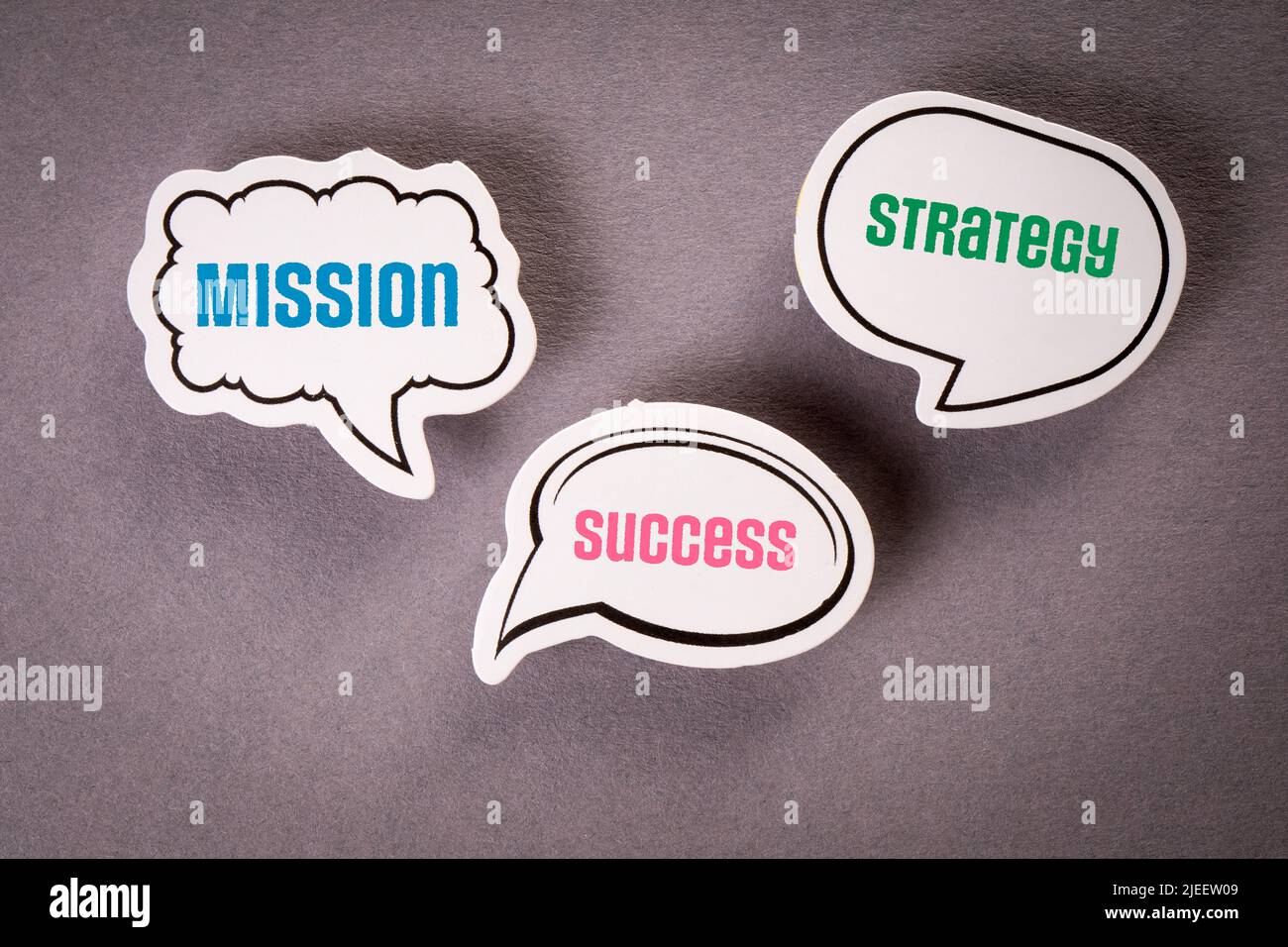 Mission Success Strategy concept. Three speech bubbles on a gray ...