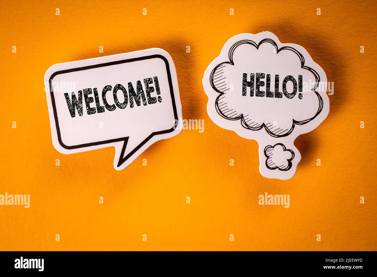 Welcome. Speech bubbles with text on an orange background Stock Photo ...