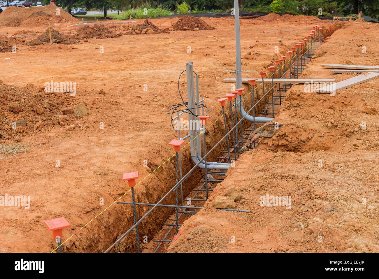 Building a house foundation with steel in a trench Stock Photo - Alamy