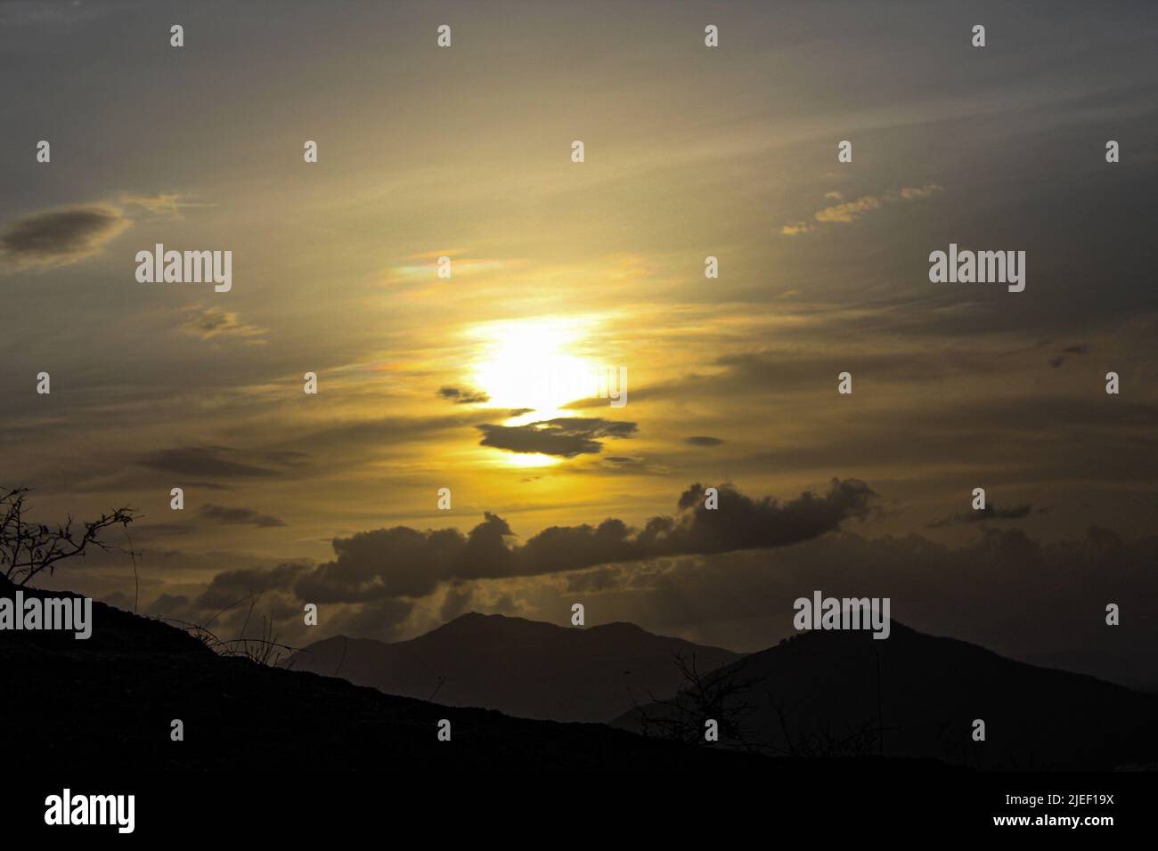 Sunset on the hill, couple in silhouette Stock Photo - Alamy