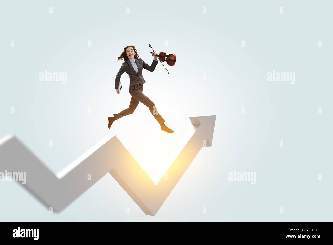 Business person climbing on red graph arrow Stock Photo - Alamy