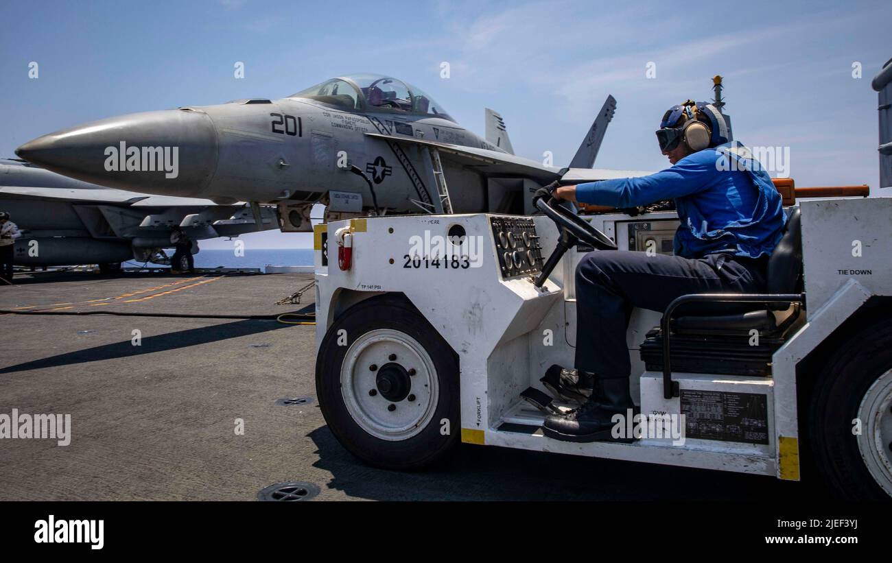 Us navy flight deck tractor hi-res stock photography and images - Alamy