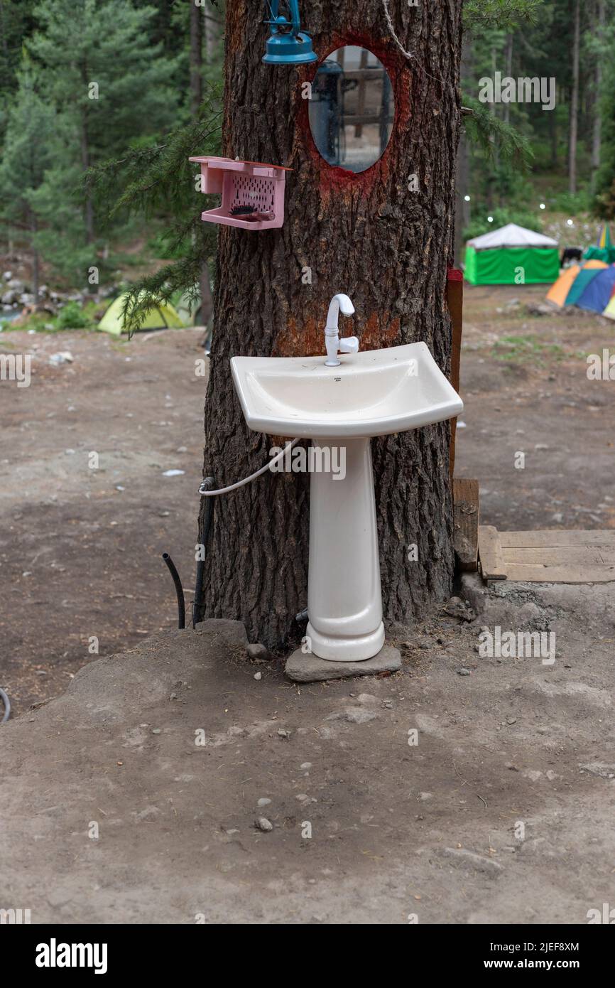 Washing hand in wash basin hi-res stock photography and images - Alamy