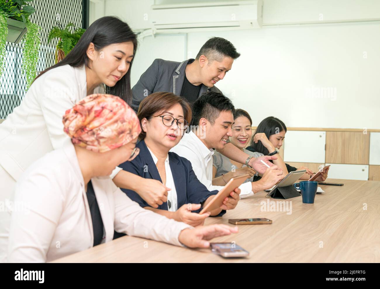 On the job training or mentoring in progress with business manager ...